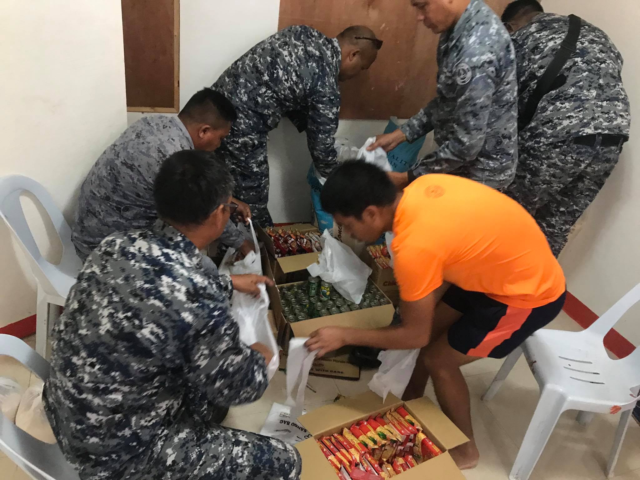 PCG Camotes donates relief goods to residents of island | Cebu Daily News