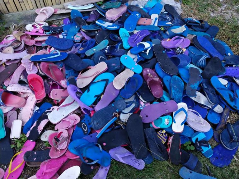 Artist from Bohol makes art out of slippers pulled out from the sea ...