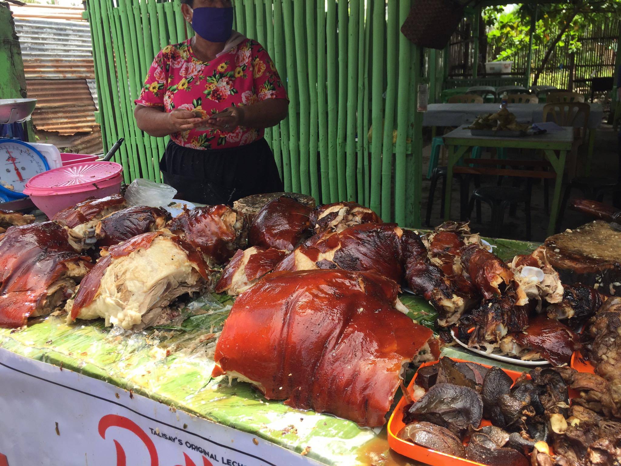 Lechon stall owners in Talisay City notice fewer sales during Halad ...