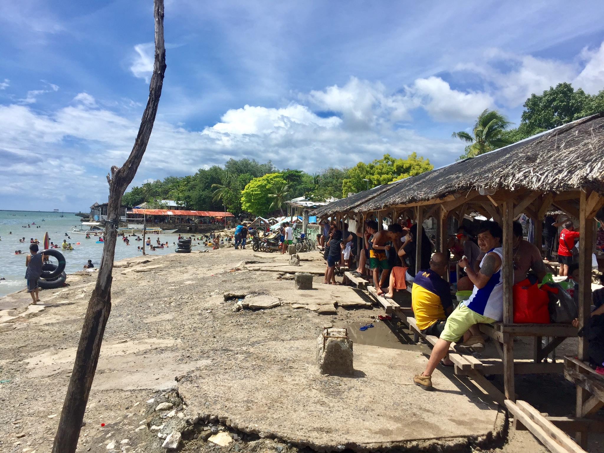 IN PHOTOS: Marigondon Beach reaches full capacity, beachgoers barred ...