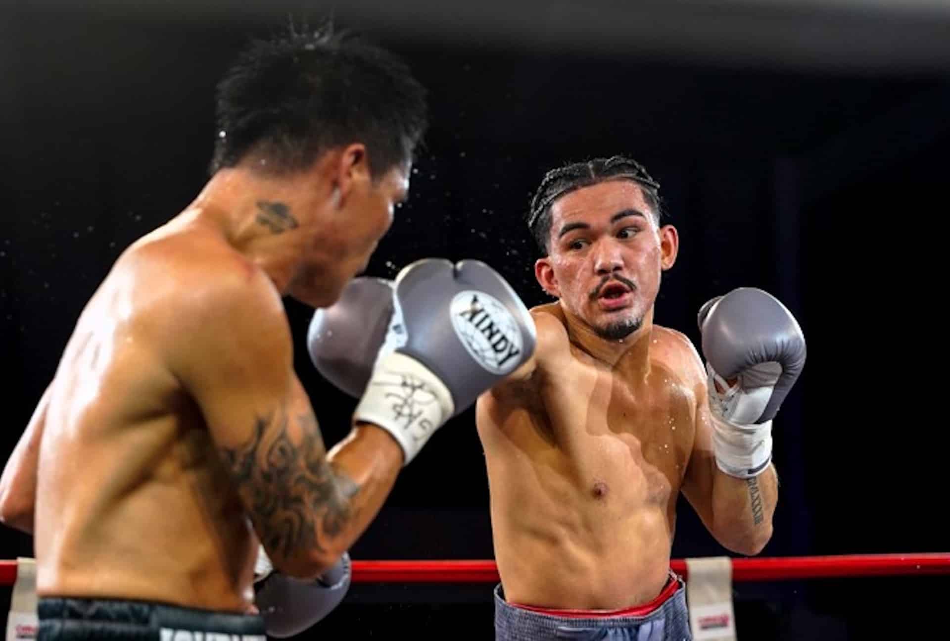 Fredriksson weathers early knockdown to outpoint Yap