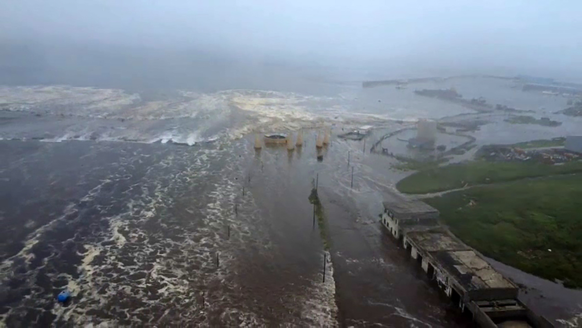 Russian TV shows buildings swept away as tsunami hits coast