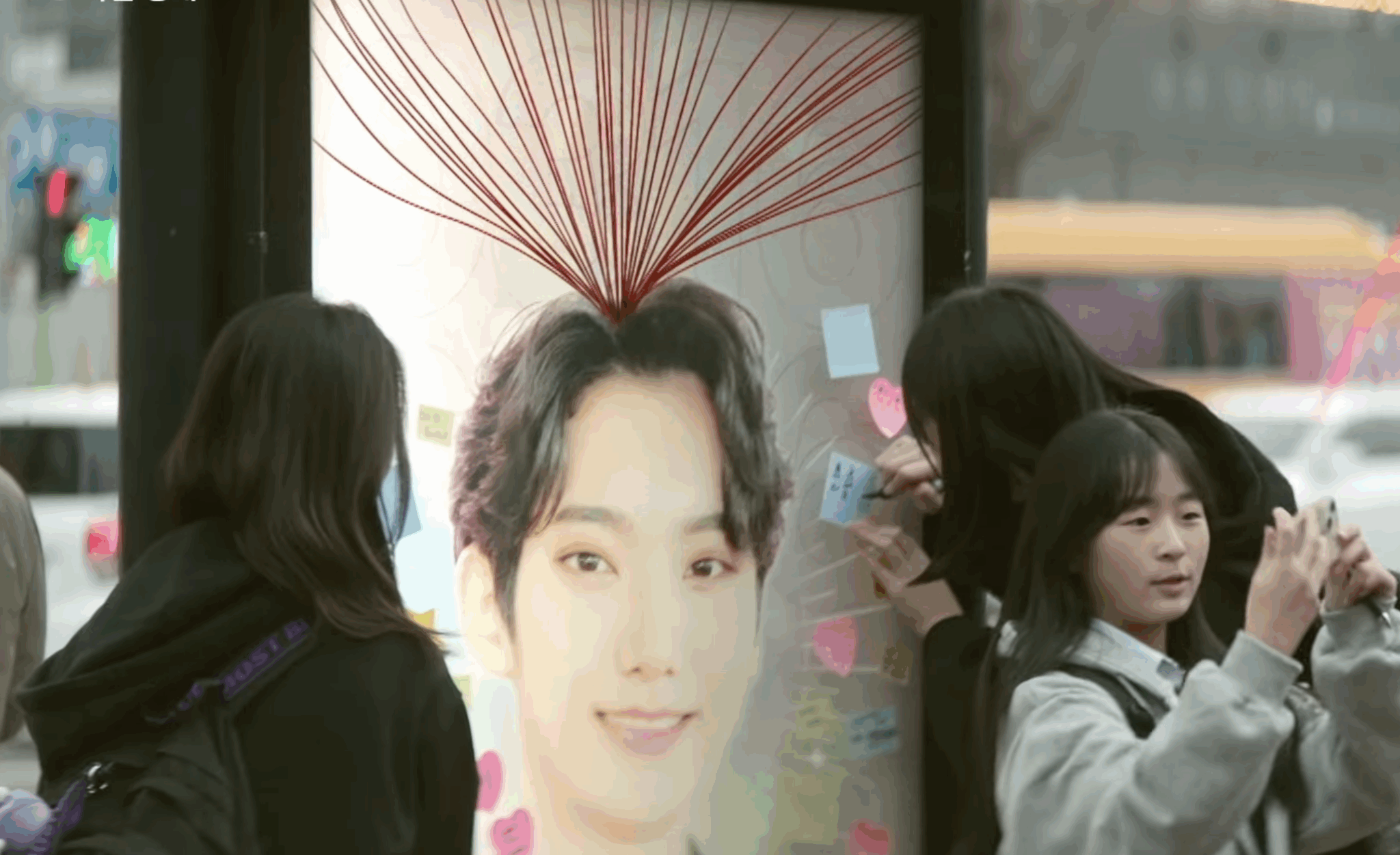 S Lines: The red lines floating above people’s heads