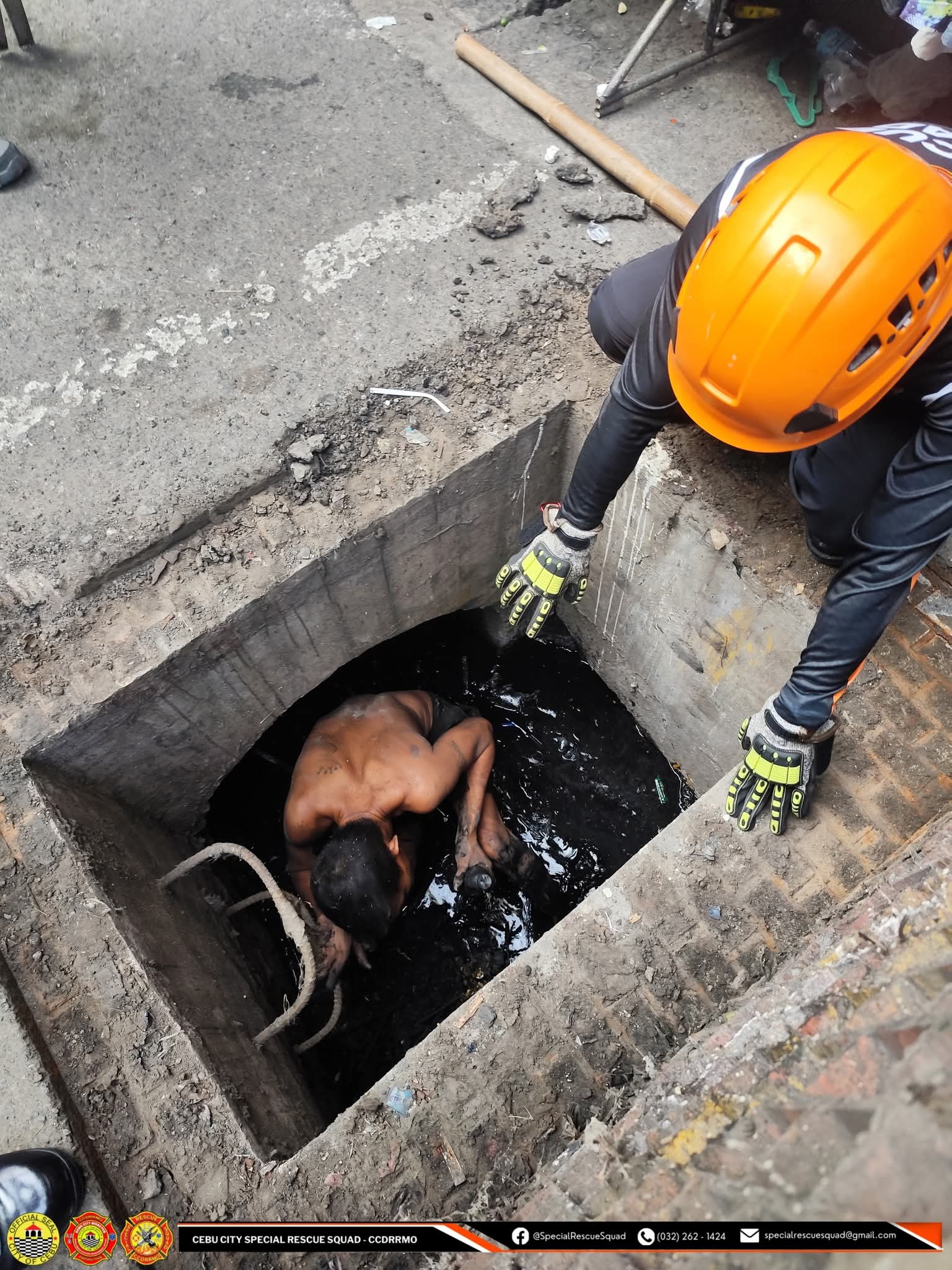 Homeless man trapped in Cebu City sewer rescued after hours underground