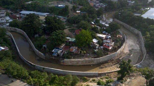 Tiny town of Malabuyoc bags more flood control projects than Mandaue ...