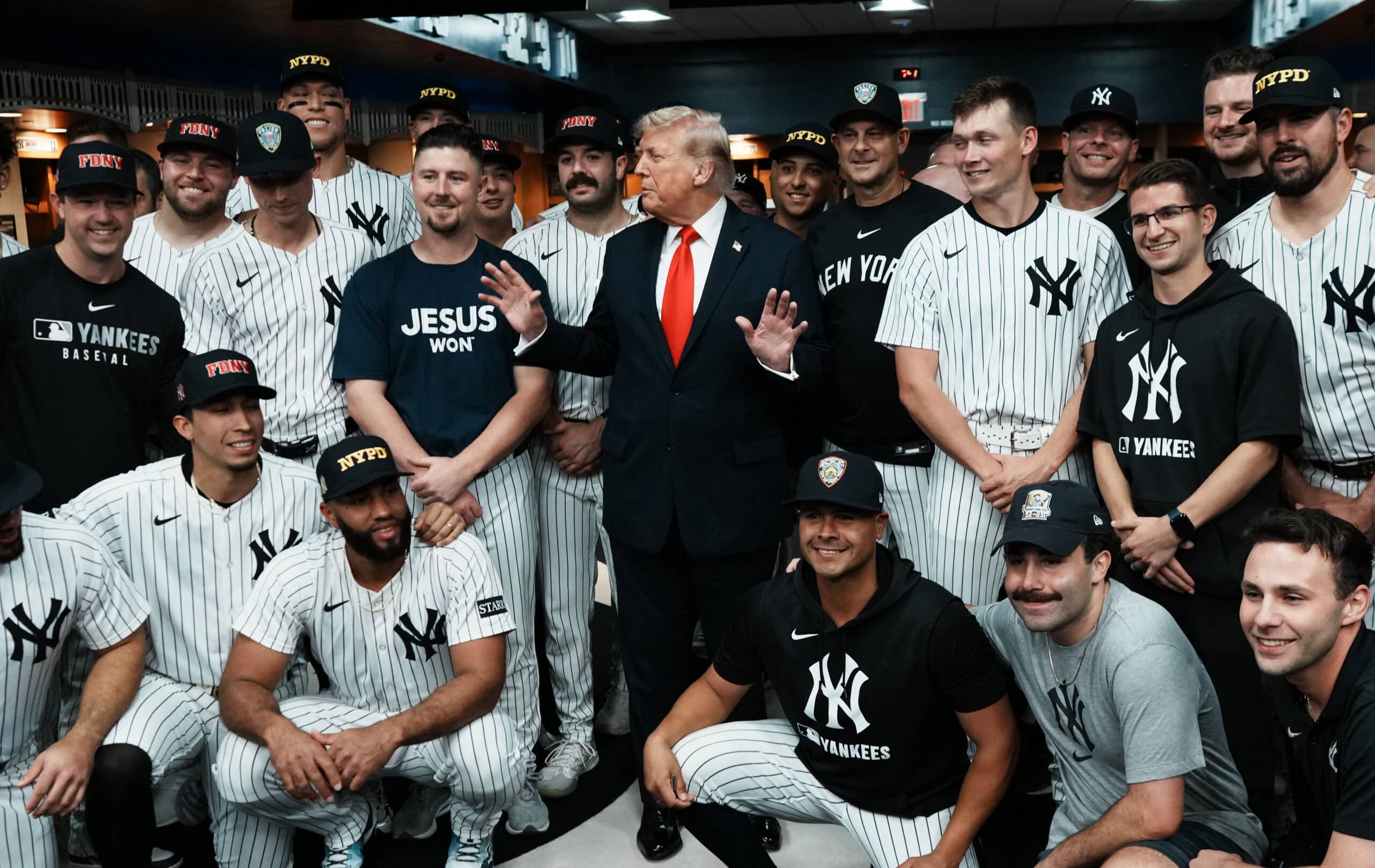Trump draws cheers marking 9/11 by attending NY Yankees game
